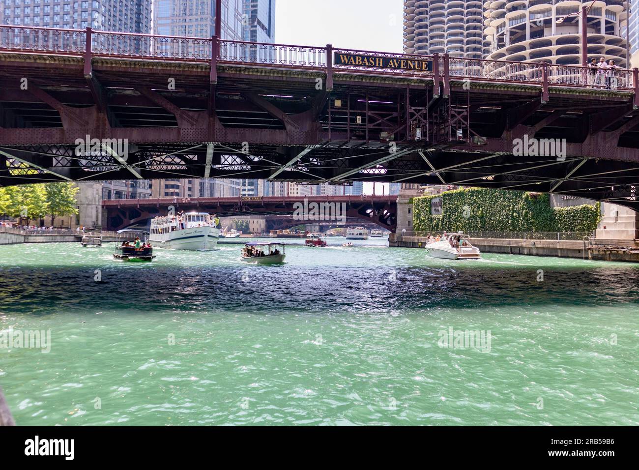 People boating and sightseeing on the Chicago River in Chicago Illinois ...