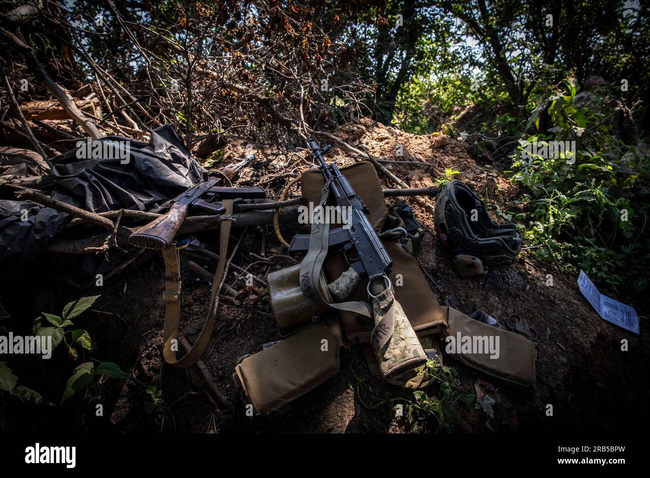 Rifles and helmet seen at an undisclosed position in Novodarivka ...