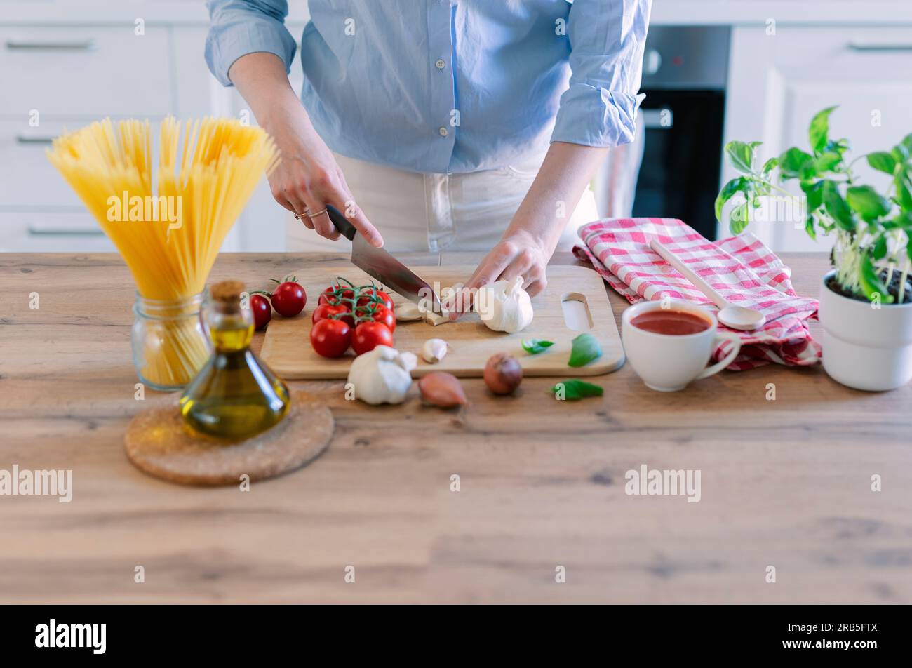 Lady preparing pasta hi-res stock photography and images - Alamy