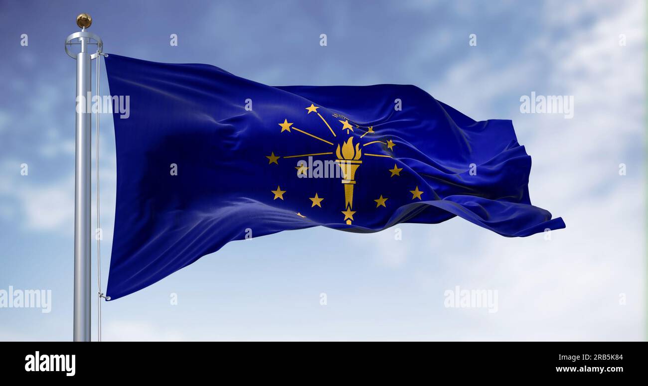 Indiana state flag waving in the wind on a clear day. Indiana is a U.S ...