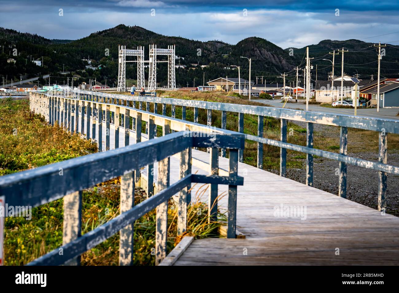Beachfront wooden boardwalk with railing overlooking the Shae Lift ...