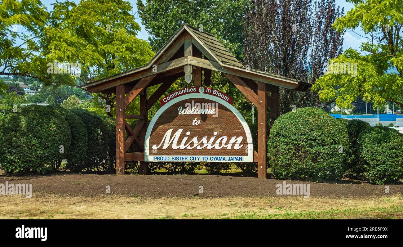 Wooden sign board with welcome written on it. Sign welcoming drivers to ...