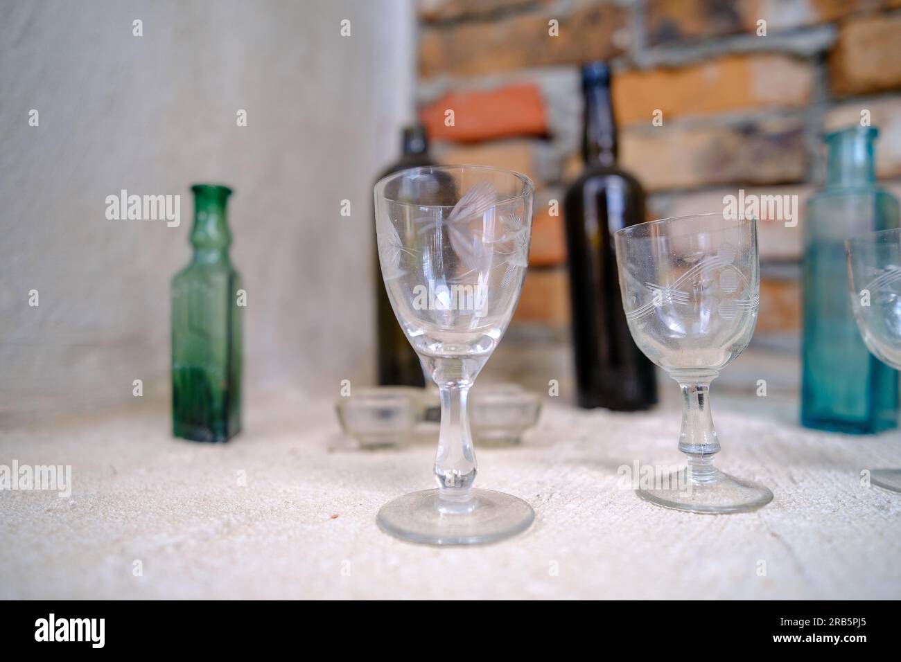 Blur of very old glass gas and glass bottles in the background Stock ...