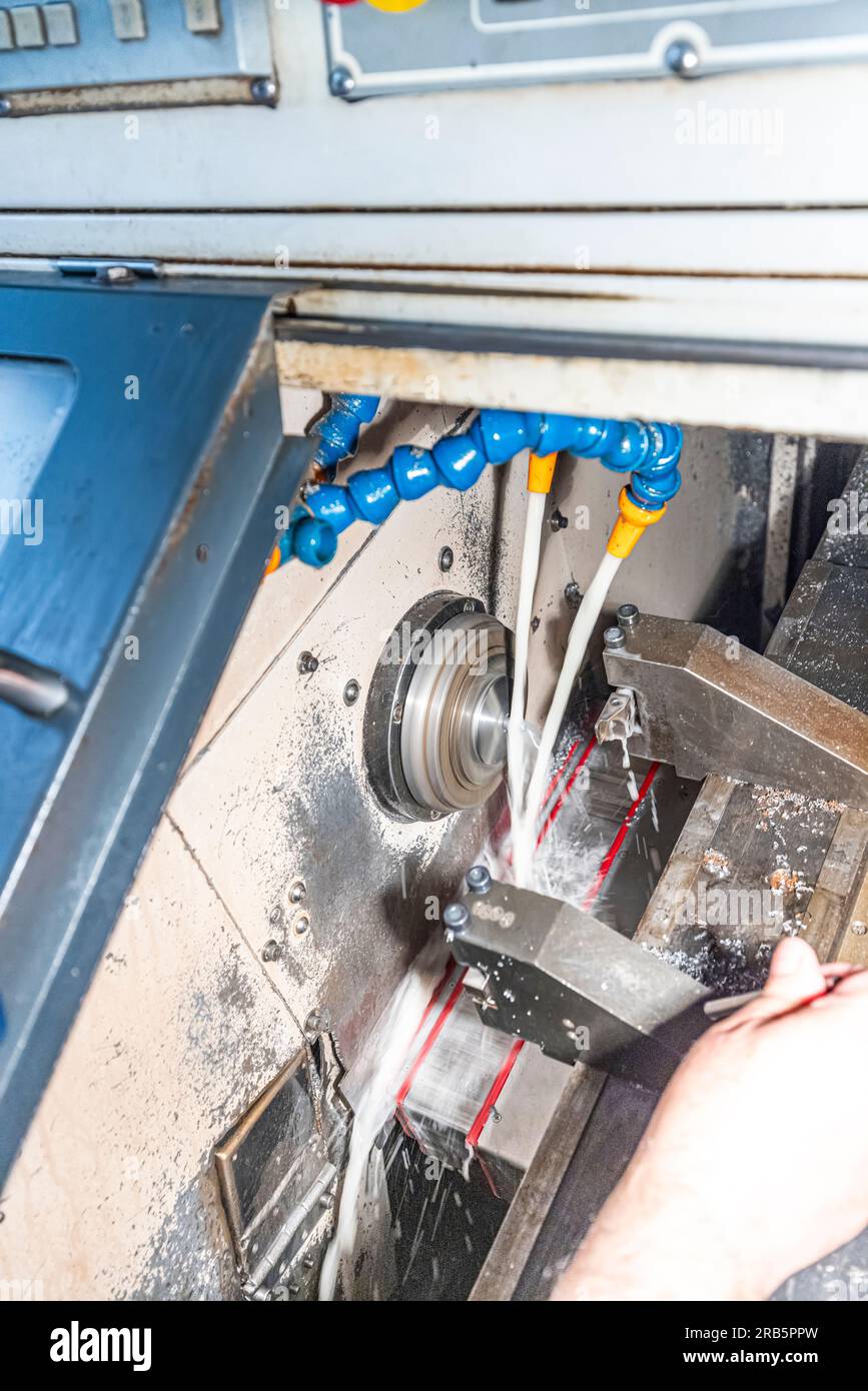 Milling metalworking process. Industrial CNC metalworking with vertical ...