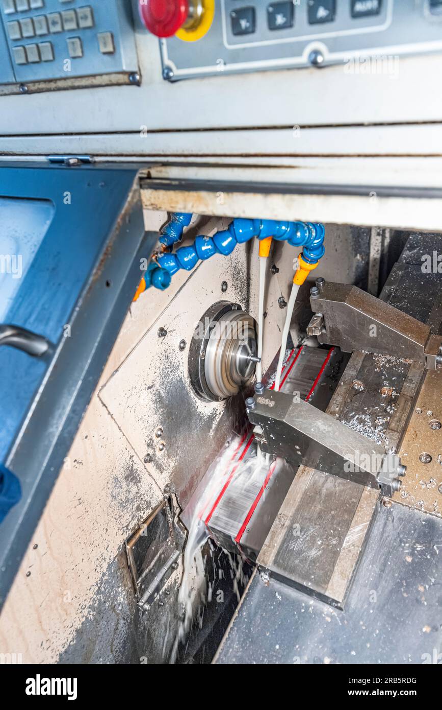 Milling metalworking process. Industrial CNC metalworking with vertical ...