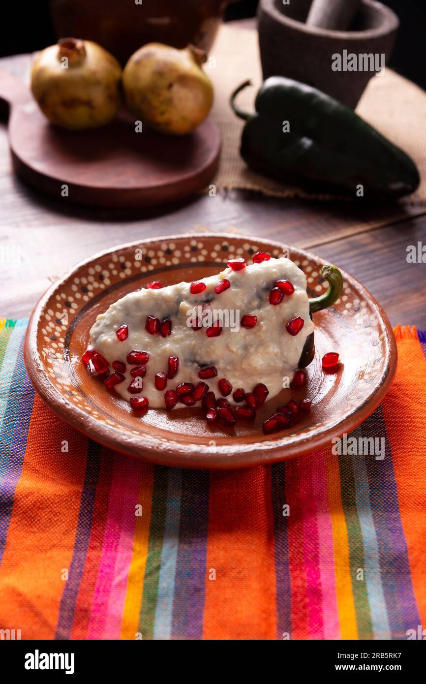 Chiles en Nogada, Typical dish from Mexico. Prepared with poblano chili ...