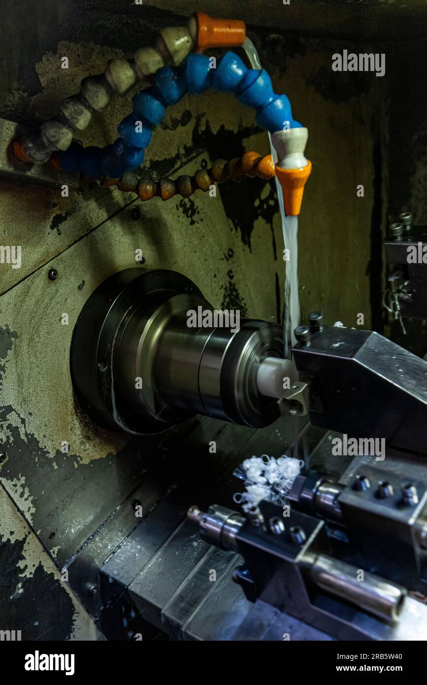 Milling metalworking process. Industrial CNC metalworking with vertical ...