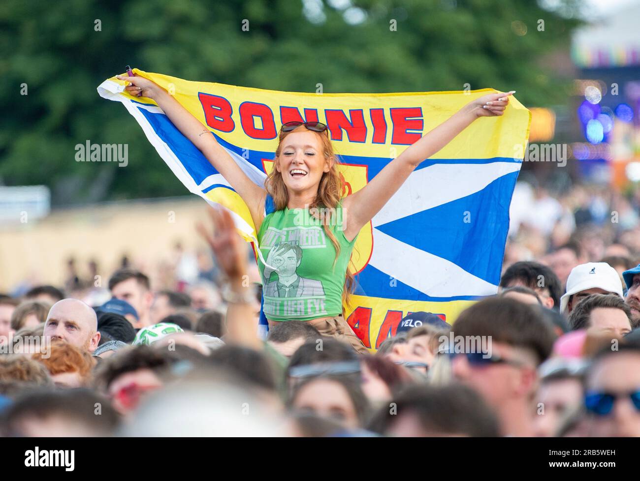 Festival goers watch George Ezra performing on the main stage at the ...