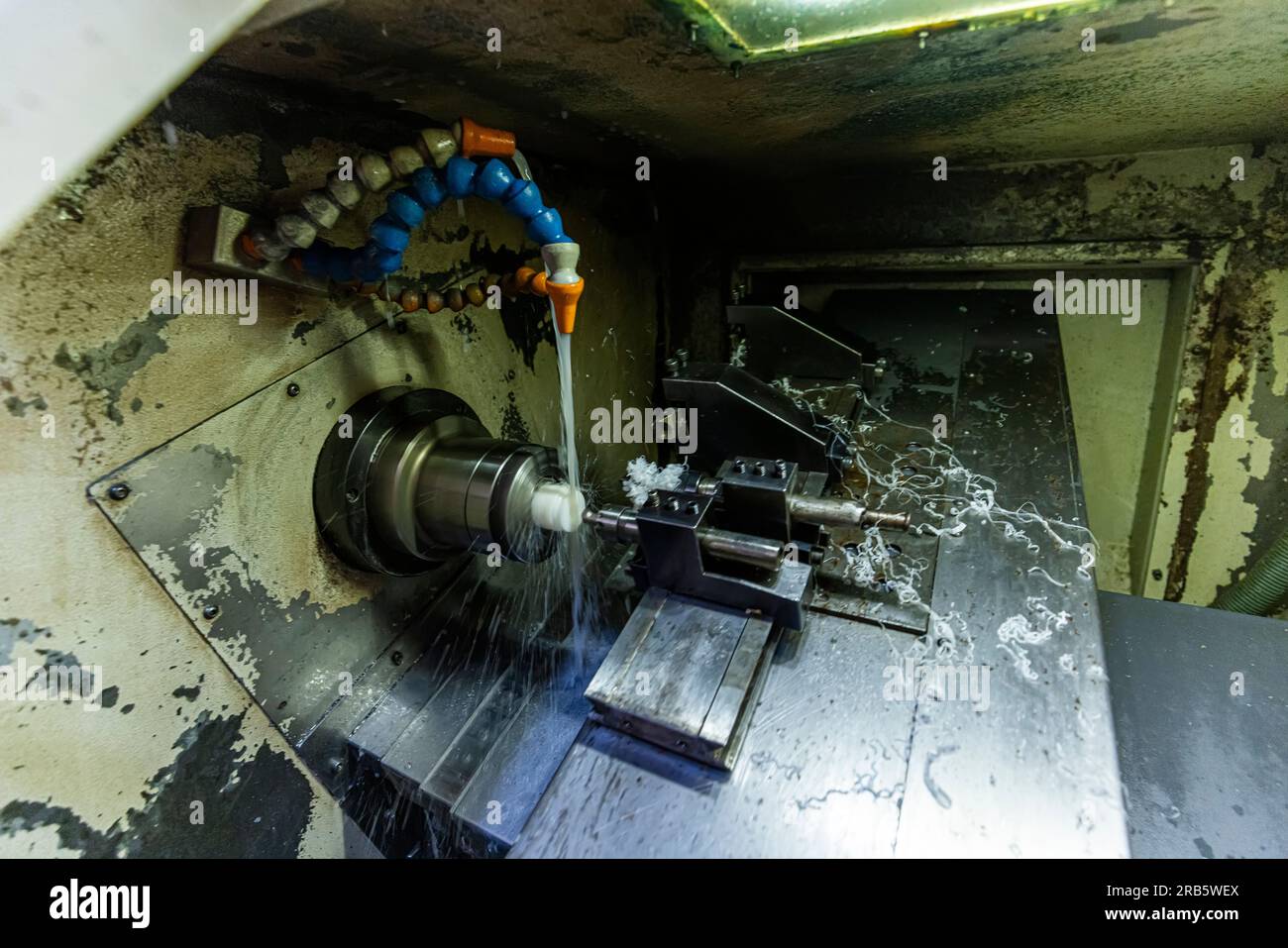 Milling metalworking process. Industrial CNC metalworking with vertical ...