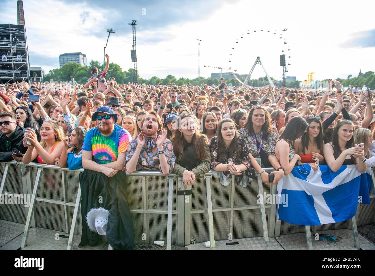 Festival goers watch George Ezra performing on the main stage at the ...
