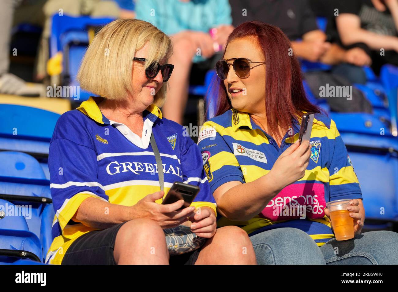 Warrington Wolves fans wear their Retro Shirts during the Betfred Super ...