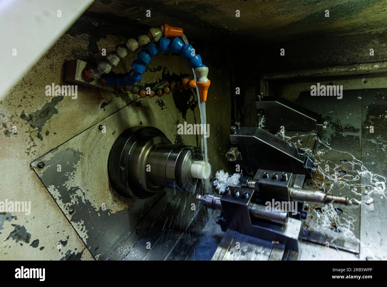 Milling metalworking process. Industrial CNC metalworking with vertical ...