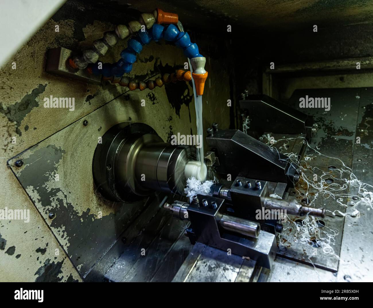 Milling metalworking process. Industrial CNC metalworking with vertical ...