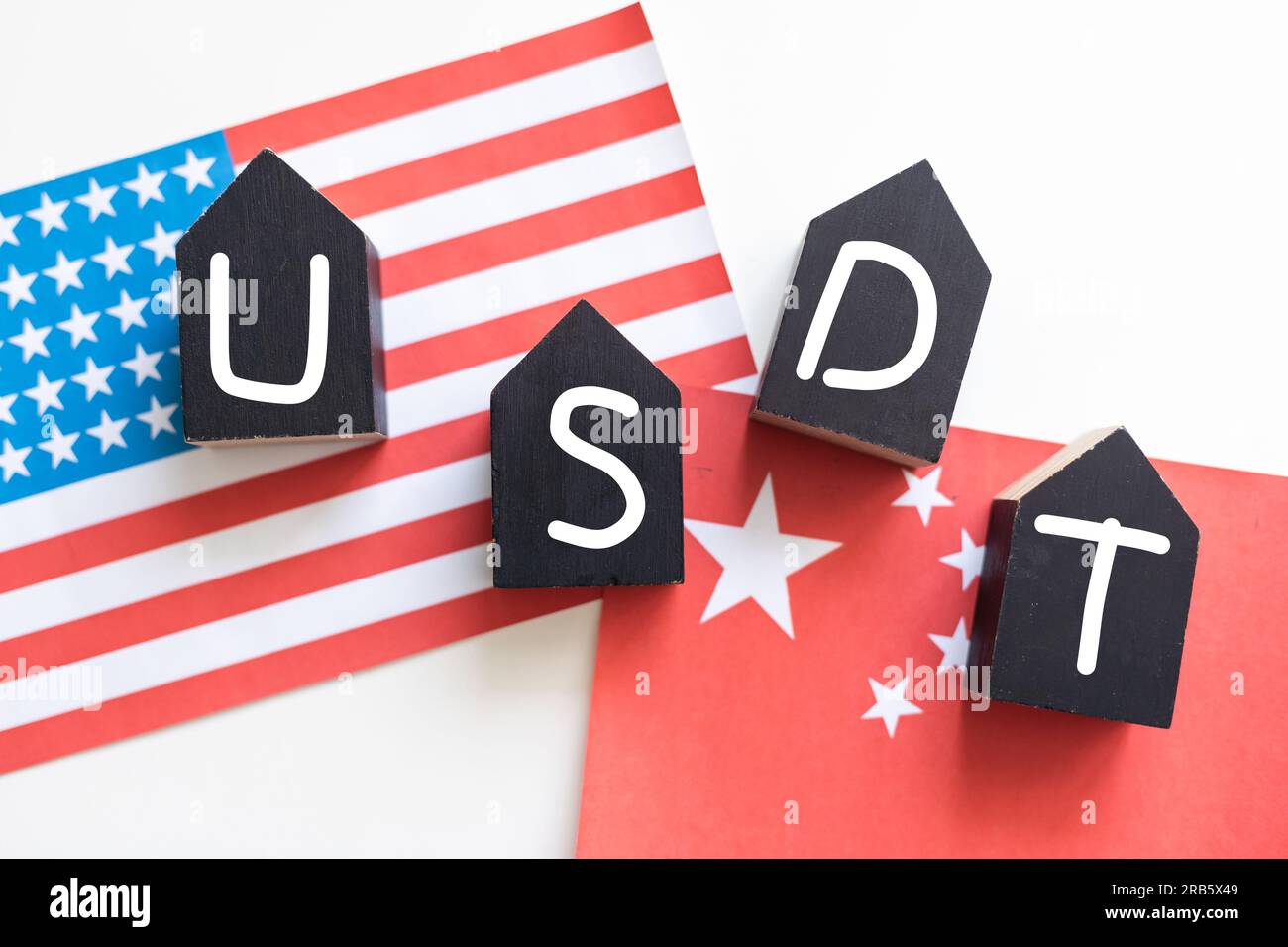 American and Сhinise currencies codes on national flags background. USD ...