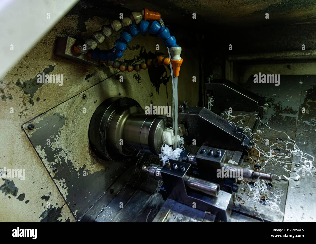 Milling metalworking process. Industrial CNC metalworking with vertical ...