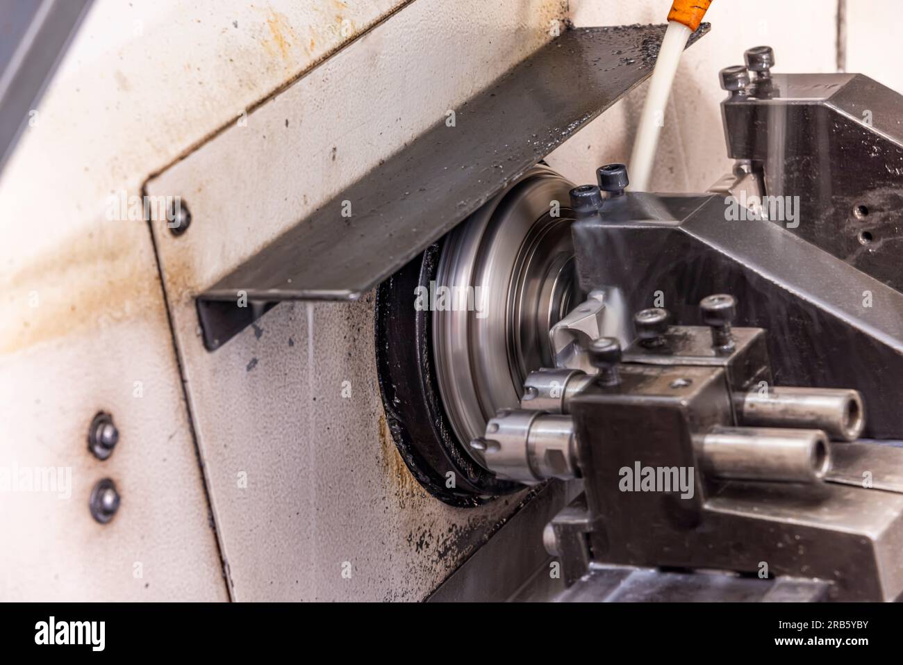 Milling metalworking process. Industrial CNC metalworking with vertical ...