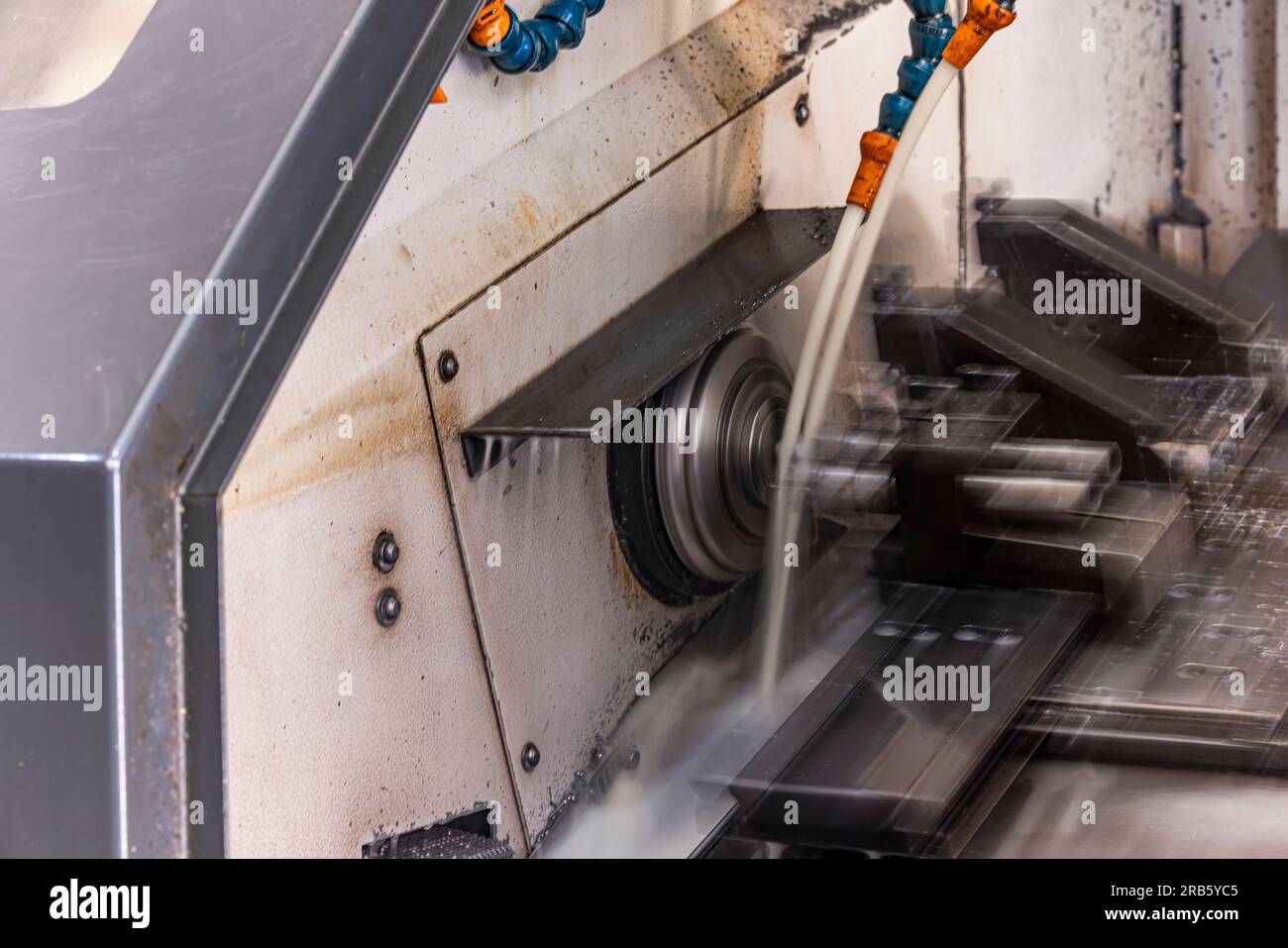 Milling metalworking process. Industrial CNC metalworking with vertical ...