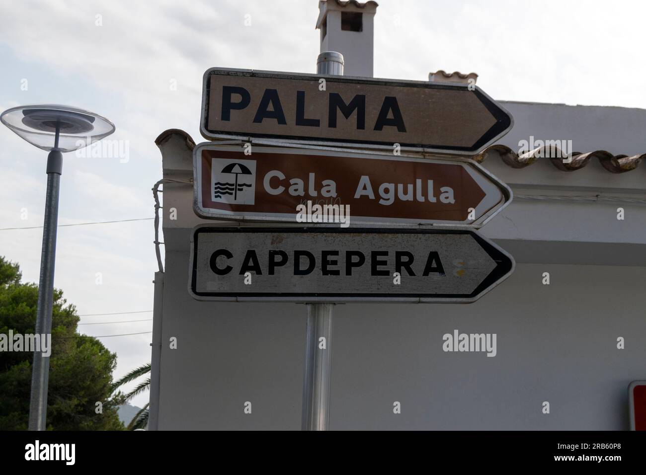 Palma Mallorca road signs to Cala Agulla and Capdepera Stock Photo - Alamy