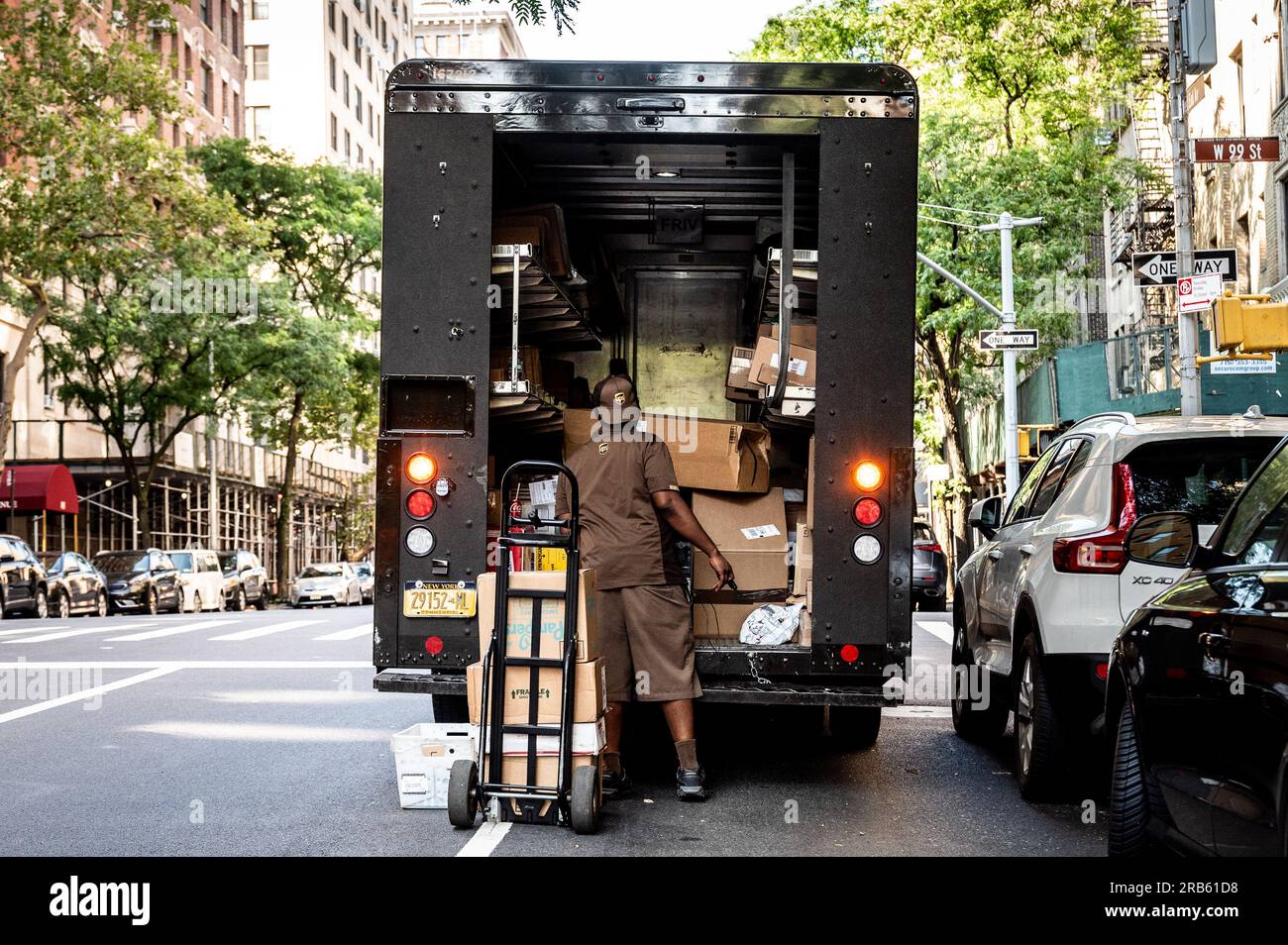 A UPS driver and his United Parcel Service (UPS) truck on the Upper ...