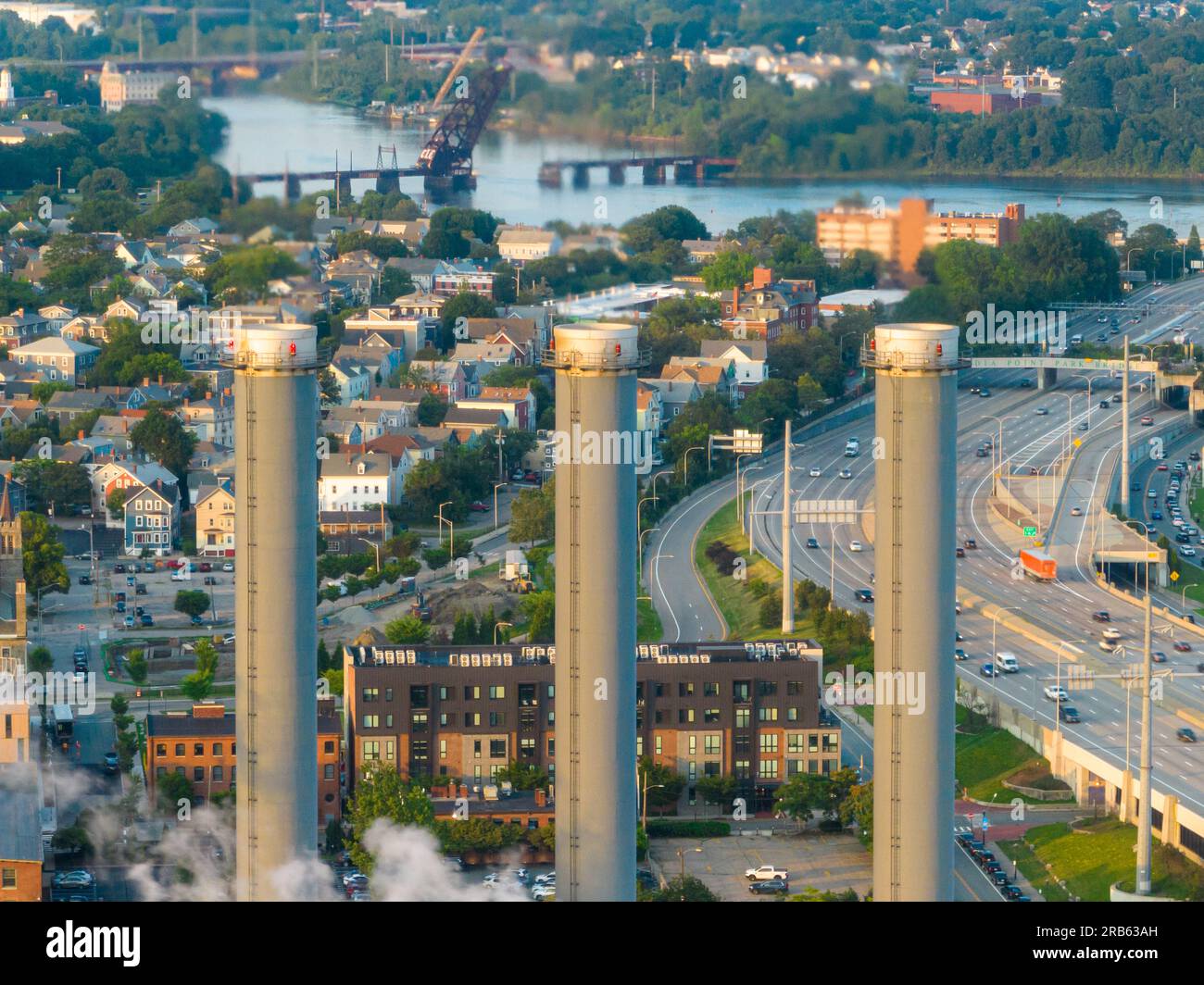 Late afternoon summer aerial image of the power plant located downtown ...