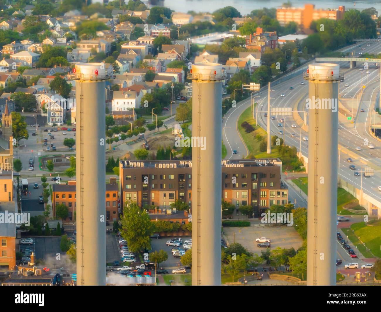 Late afternoon summer aerial image of the power plant located downtown ...