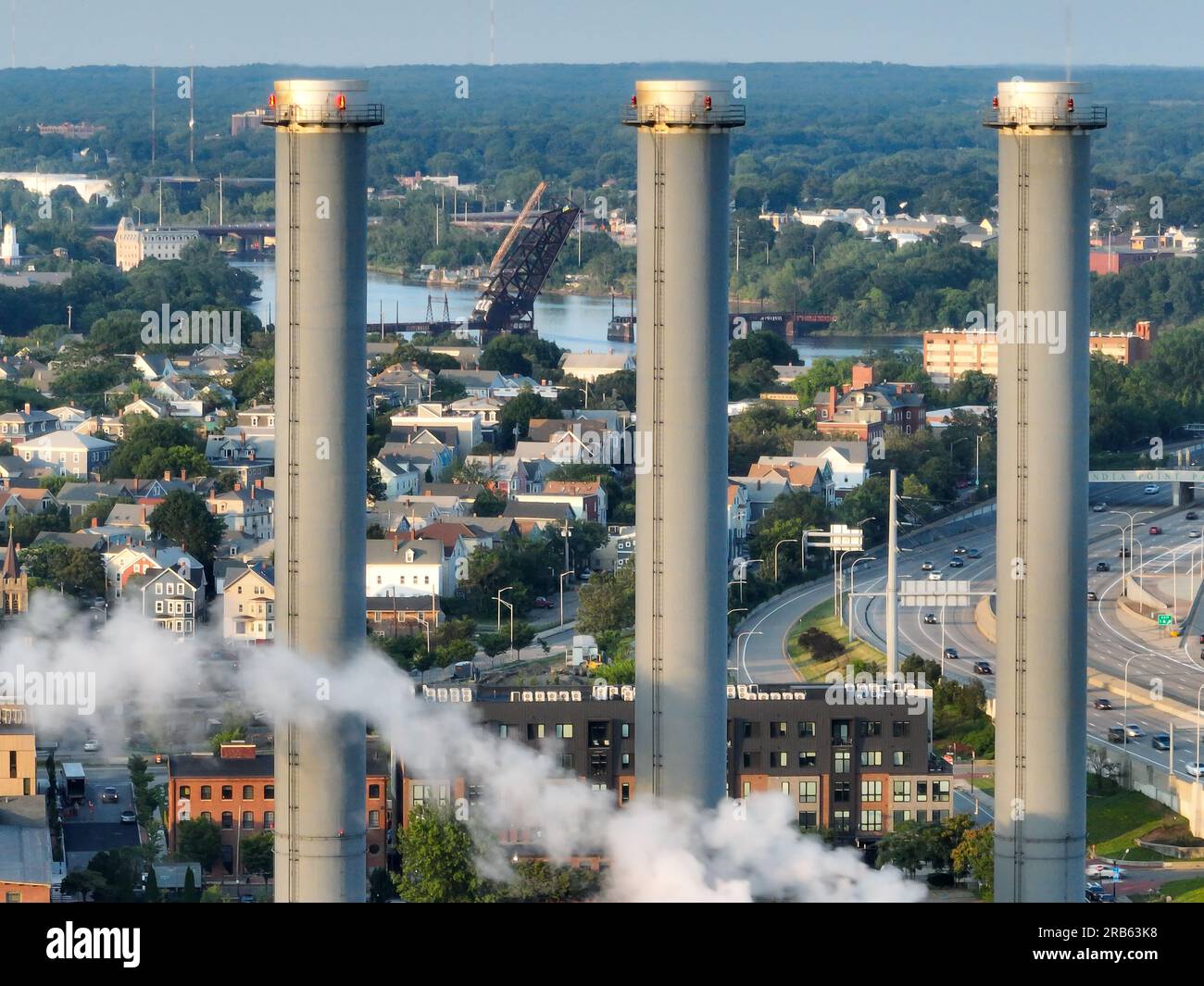 Late afternoon summer aerial image of the power plant located downtown ...