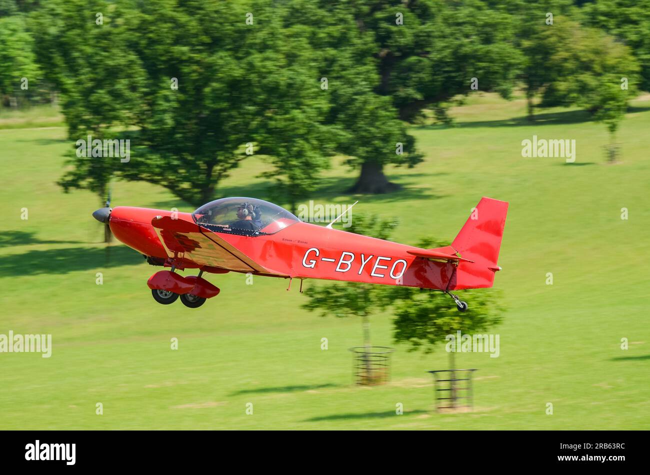 Zenair CH-601 HDS Zodiac plane taking off from the grass airstrip at a ...