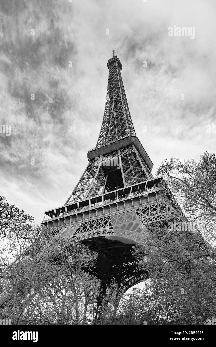 Morning view of Eiffel Tower from bottom. Paris, France. Black and ...