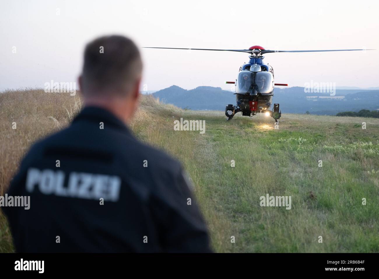 Bad Schandau, Germany. 07th July, 2023. A police helicopter with a ...
