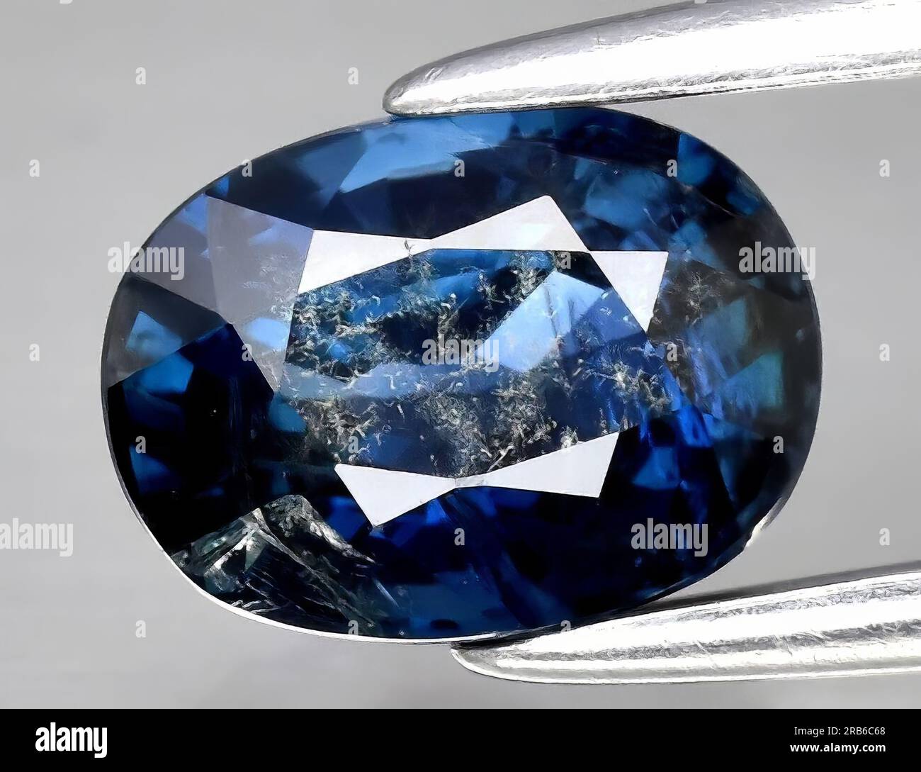 Natural gemstone blue sapphire isolated on white background Stock Photo ...