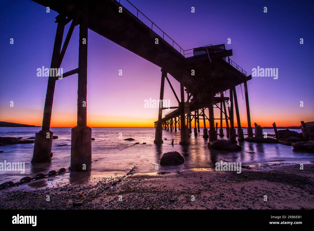 Scenic colourful sunrise at Middle camp beach on PAcific coast of ...
