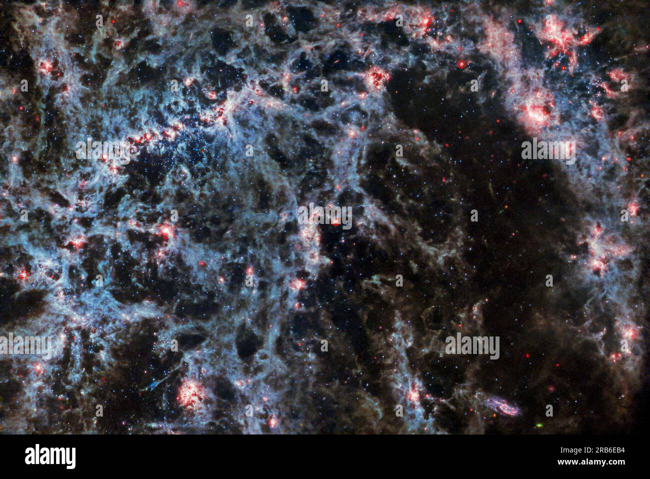 June 2, 2023 - Space - A delicate tracery of dust and bright star ...