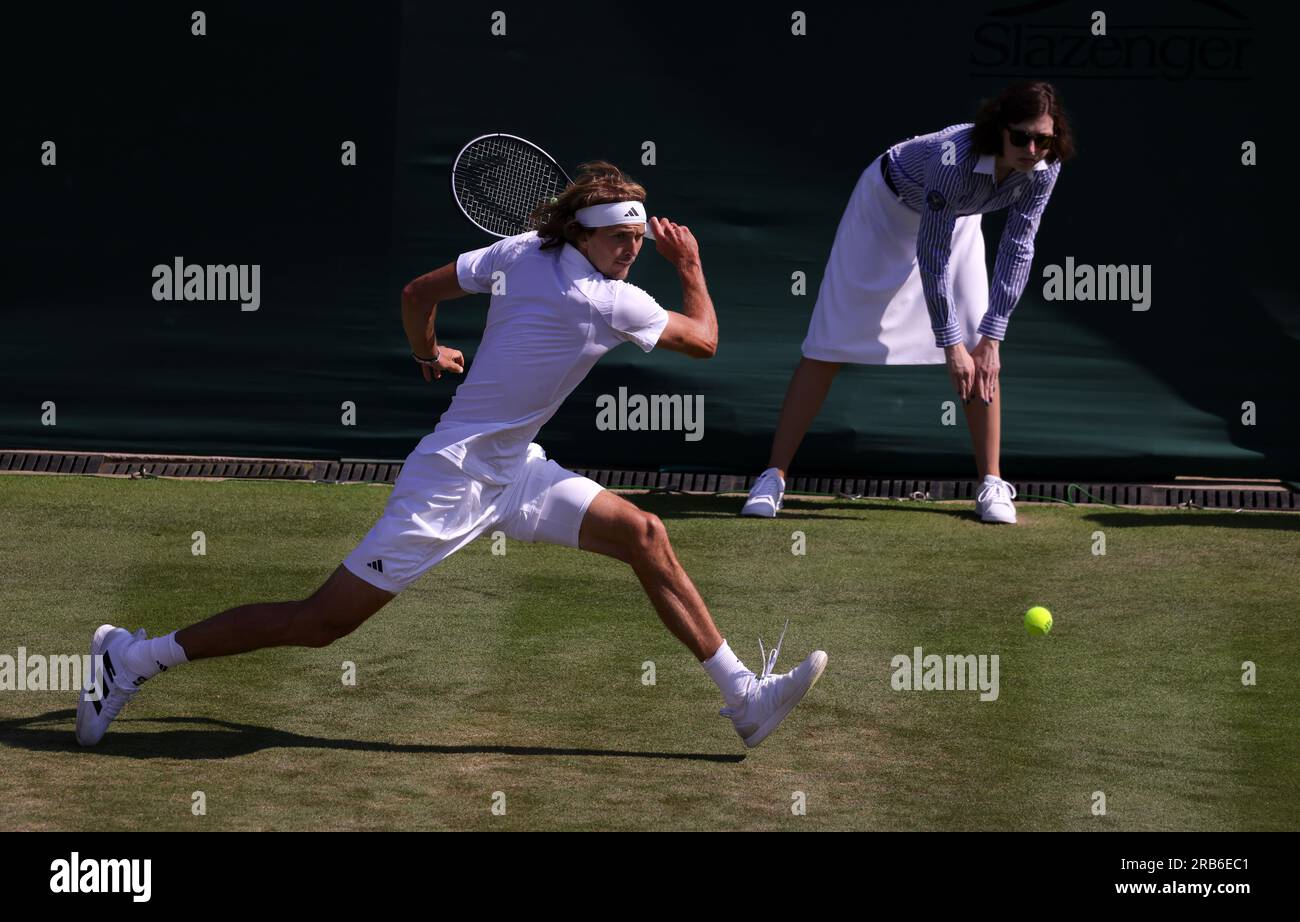 Wimbledon. Alexander Zverev stretches wide for a backhand during second ...
