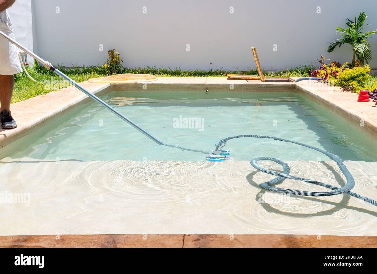 Male pool cleaner hi-res stock photography and images - Alamy