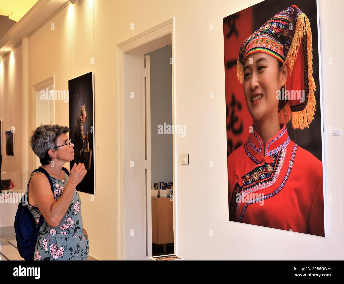 Beirut, Lebanon. 7th July, 2023. A woman views a photo at the "Villages ...