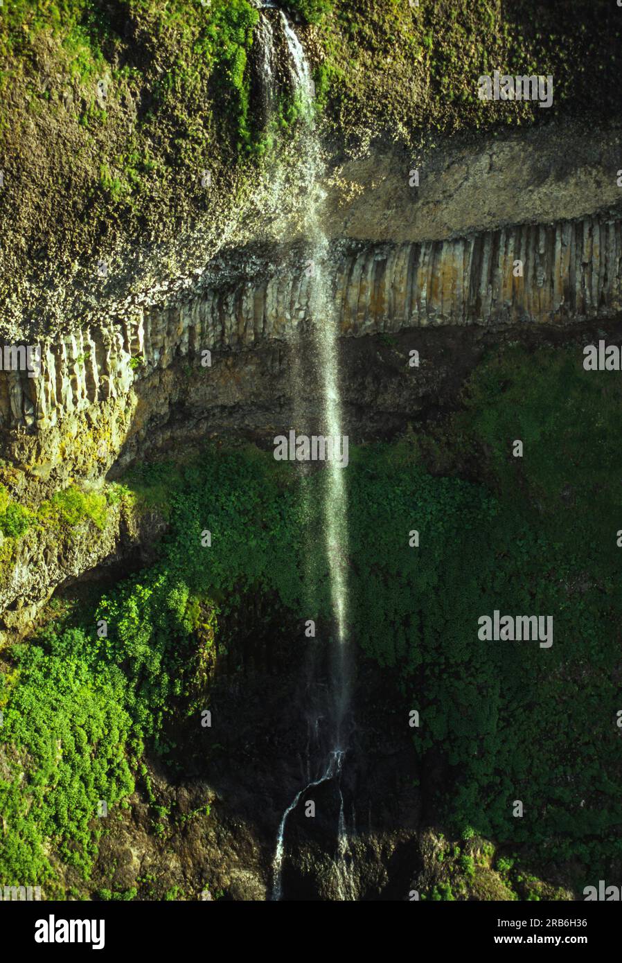 Aerial image of mountain waterfall going over cliff, Oregon, US Stock ...