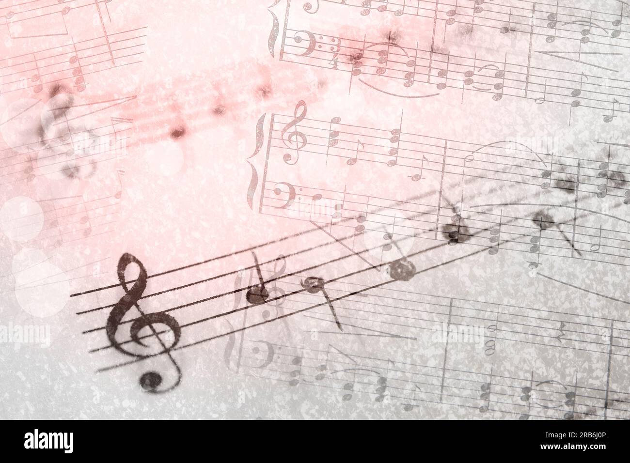 Sheets with music notes as background, double exposure. Bokeh and color ...