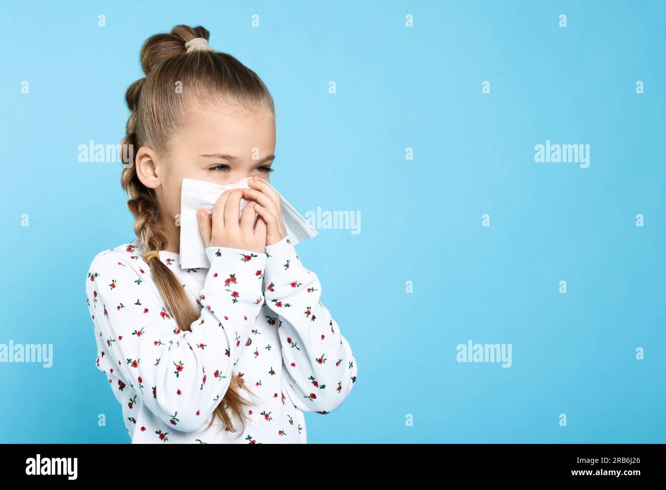 Sick girl blowing nose hi-res stock photography and images - Alamy