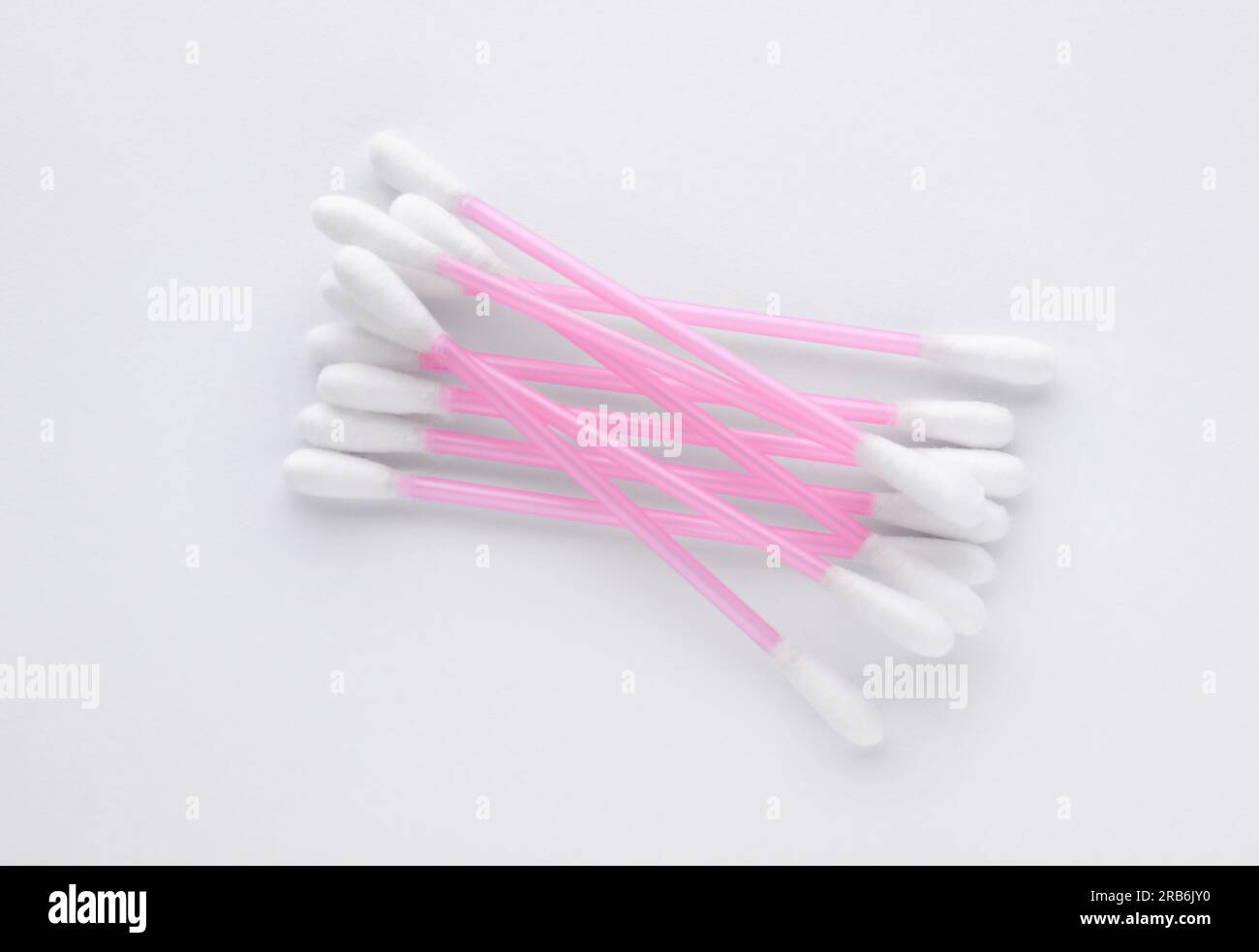 Clean cotton buds isolated on white, top view Stock Photo - Alamy