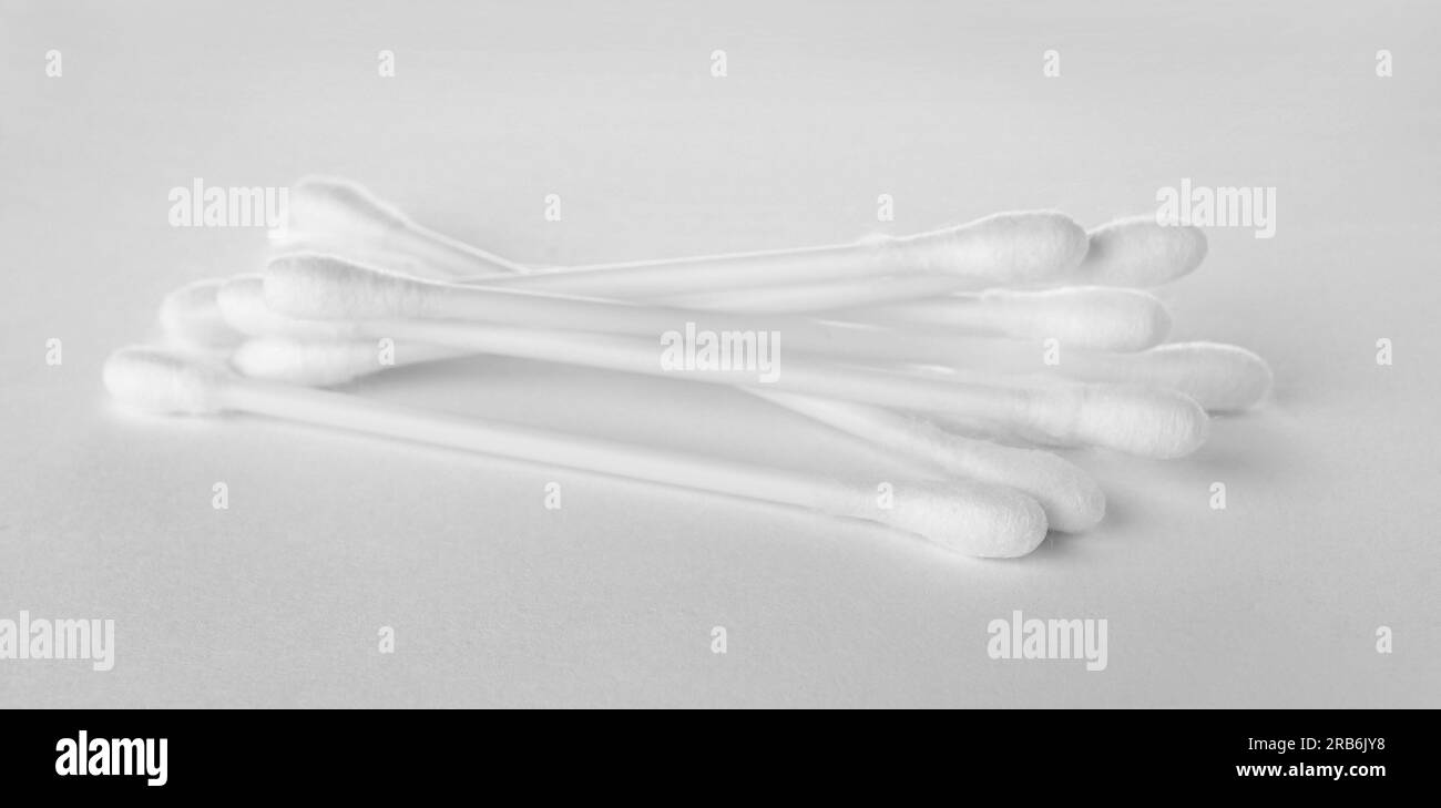 Heap of clean cotton buds on white background Stock Photo - Alamy