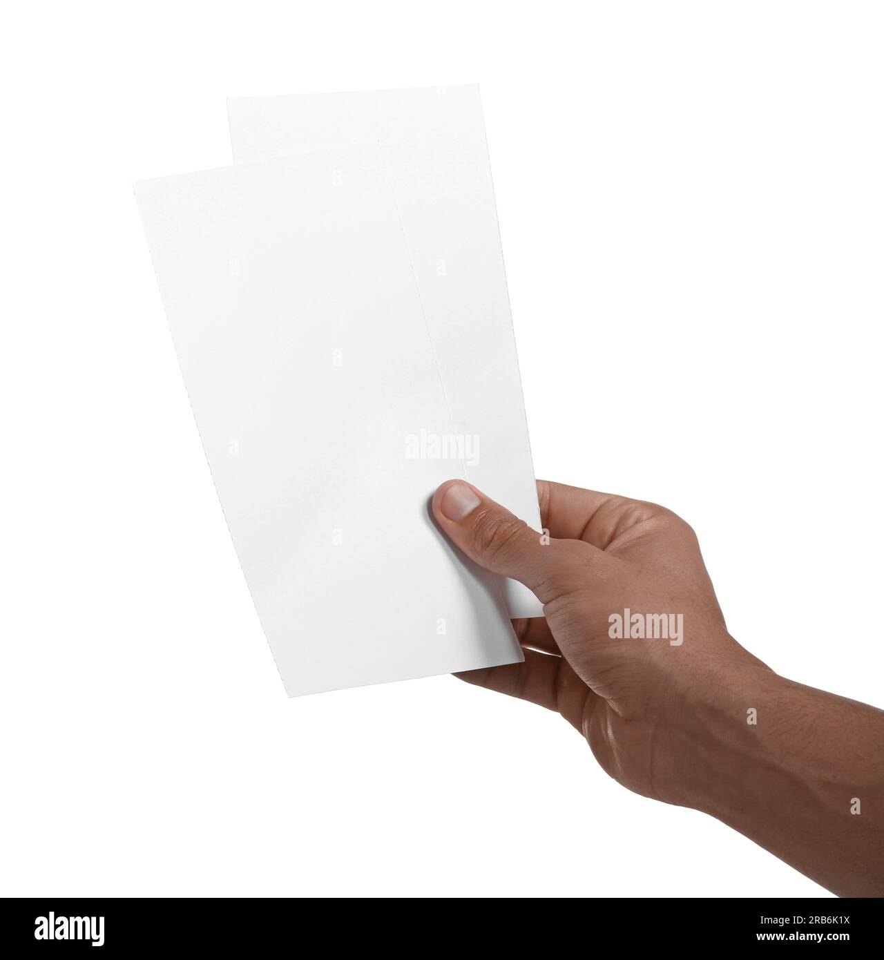 Man holding flyers on white background, closeup. Mockup for design ...