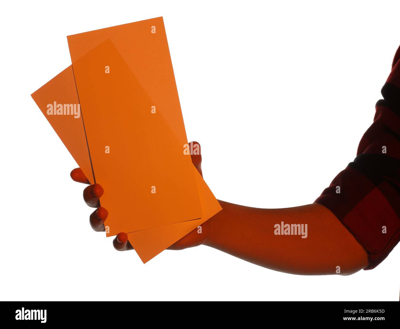 Man holding flyers on white background, closeup and space for text ...