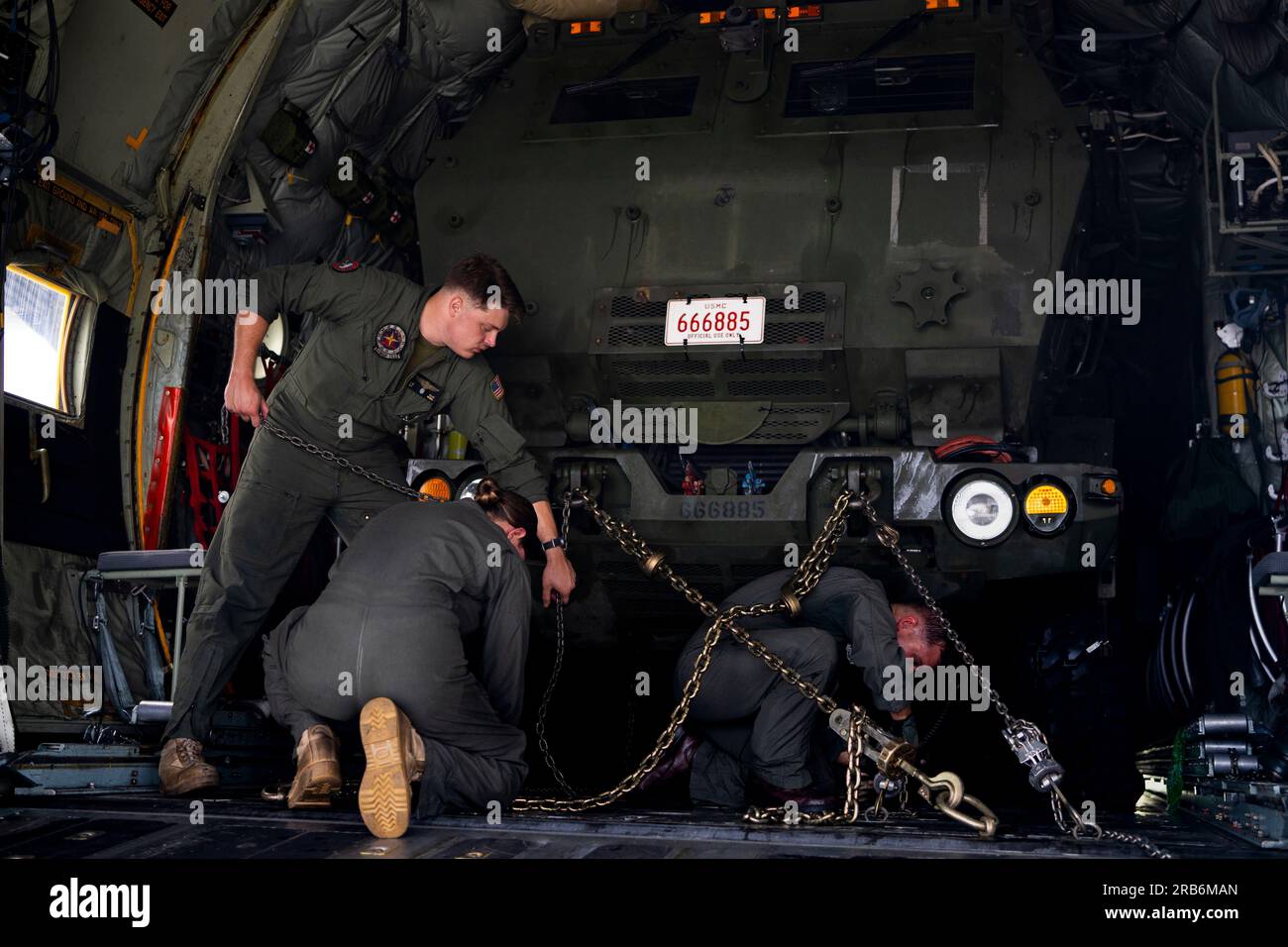 U.S. Marines with Marine Aerial Refueler Transport Squadron (VMGR) 152 secure an M142 High ...