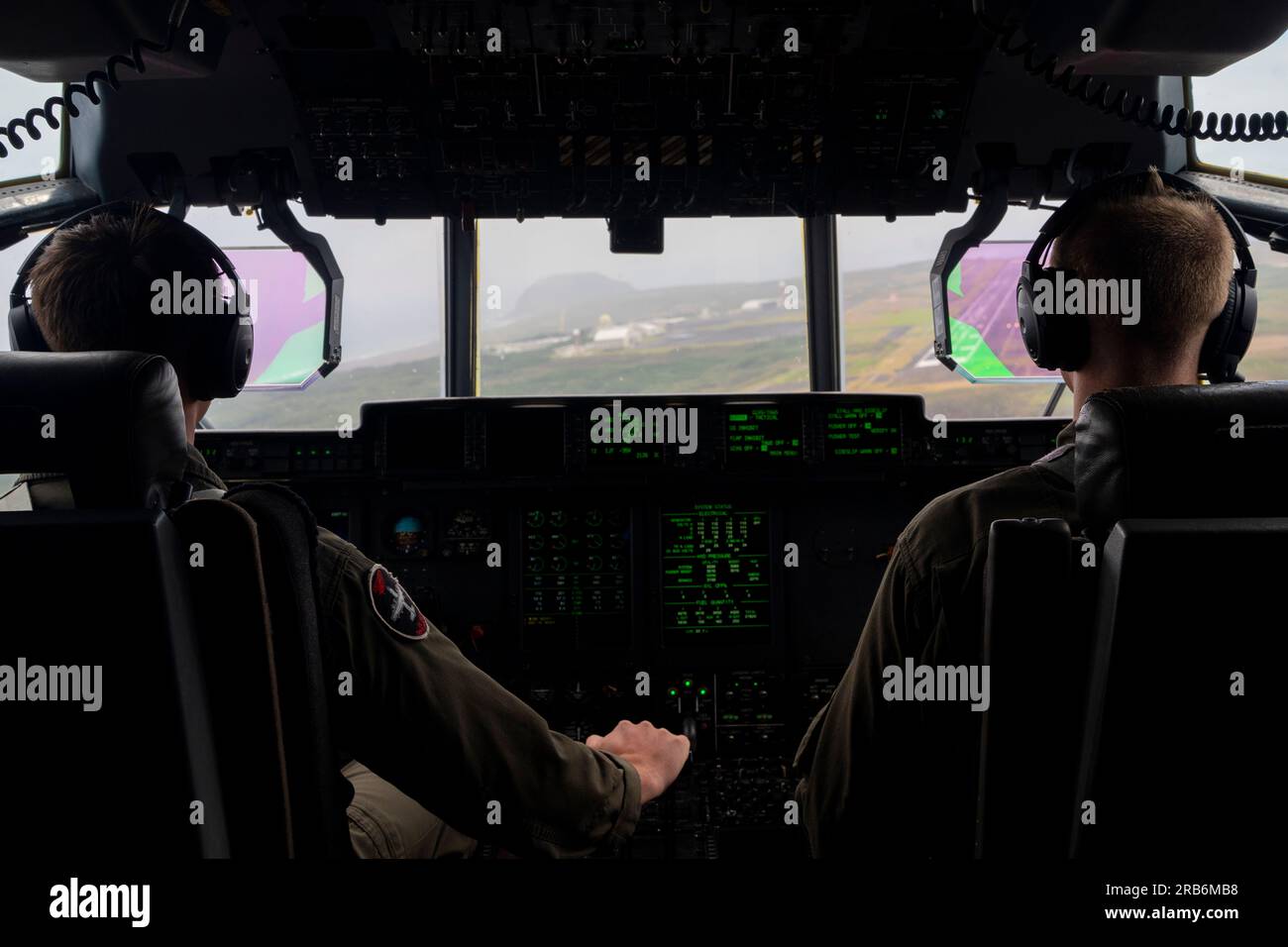 U.S. Marine Corps Capt. Kale Heckerson, left, and Capt. Randall Halpin ...