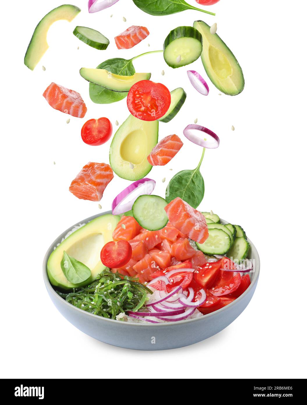 Poke recipe. Different ingredients falling into bowl on white ...