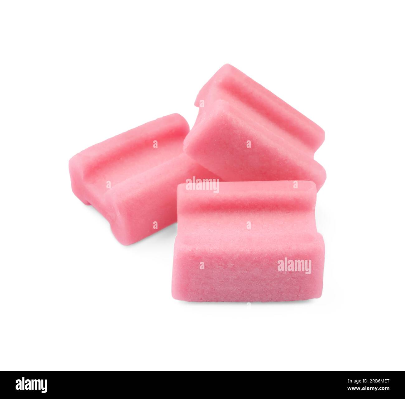 Tasty pink chewing gums on white background Stock Photo - Alamy
