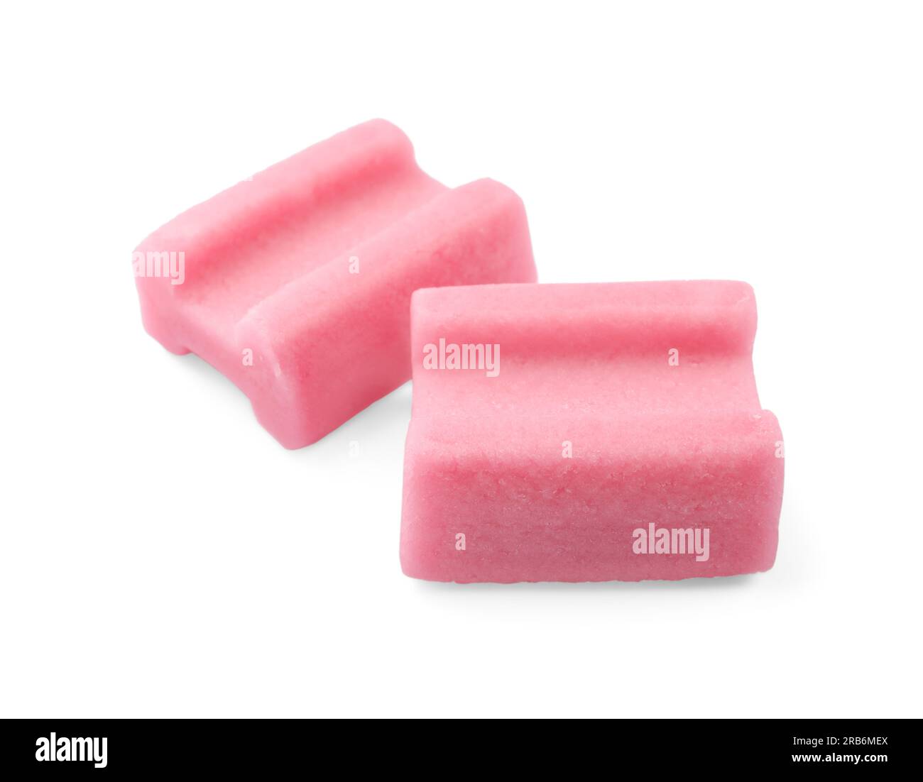 Tasty pink chewing gums on white background Stock Photo - Alamy