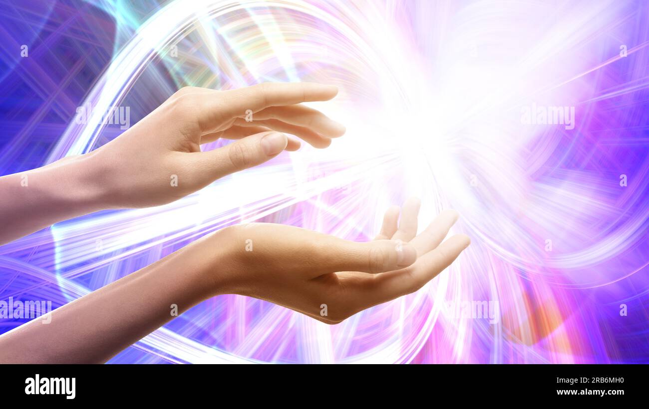 Aura phenomena. Woman with flows of energy around her hands against ...