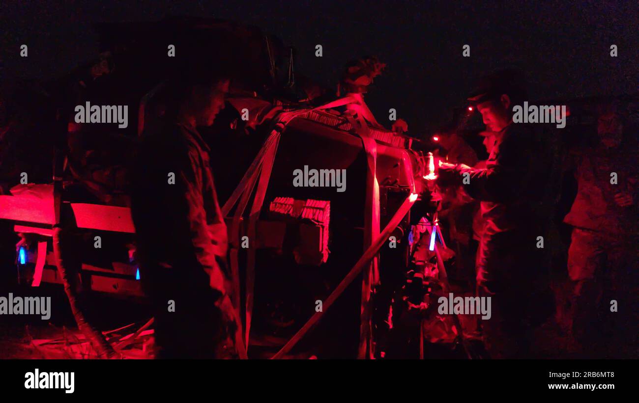 U.S. Army Soldiers assigned to the 18th Airborne Corps, derig the heavy ...