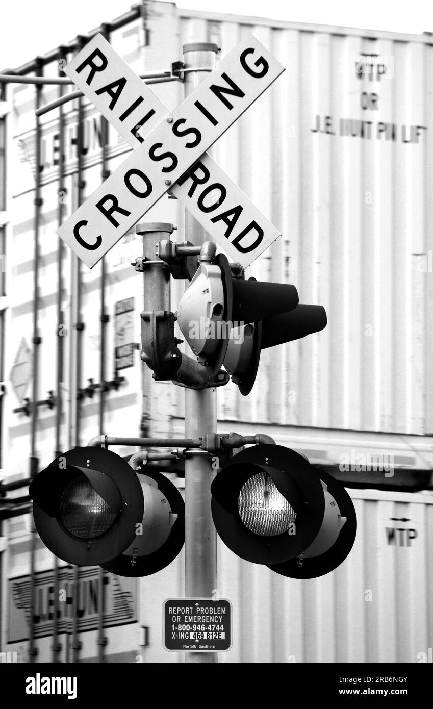 A freight train travels past a highway railroad crossing in Abingdon ...